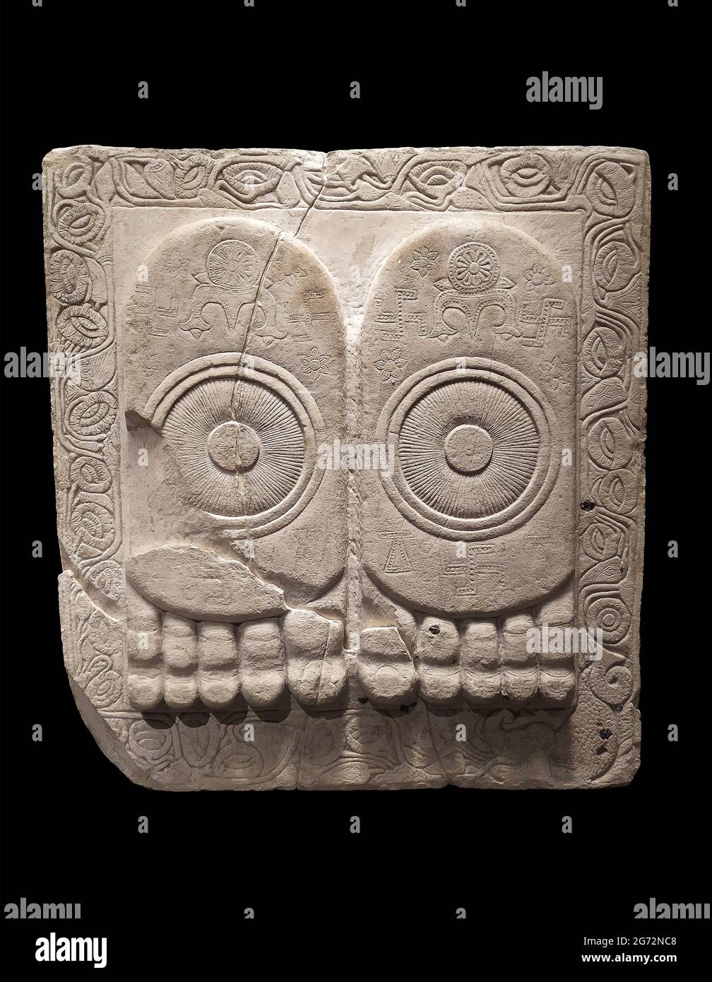 A Buddhapada stone plaque representing the Buddha's footprints Stock ...