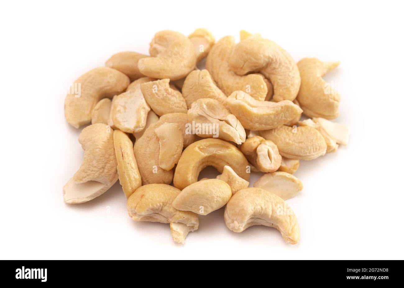 Pile of Raw Natural Cashew Nut Pieces Isolated on a White Background ...