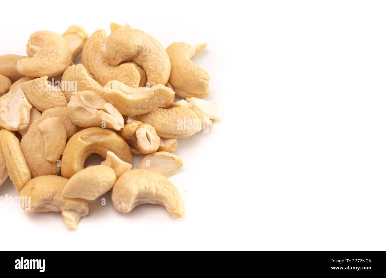 Pile of Raw Natural Cashew Nut Pieces Isolated on a White Background ...