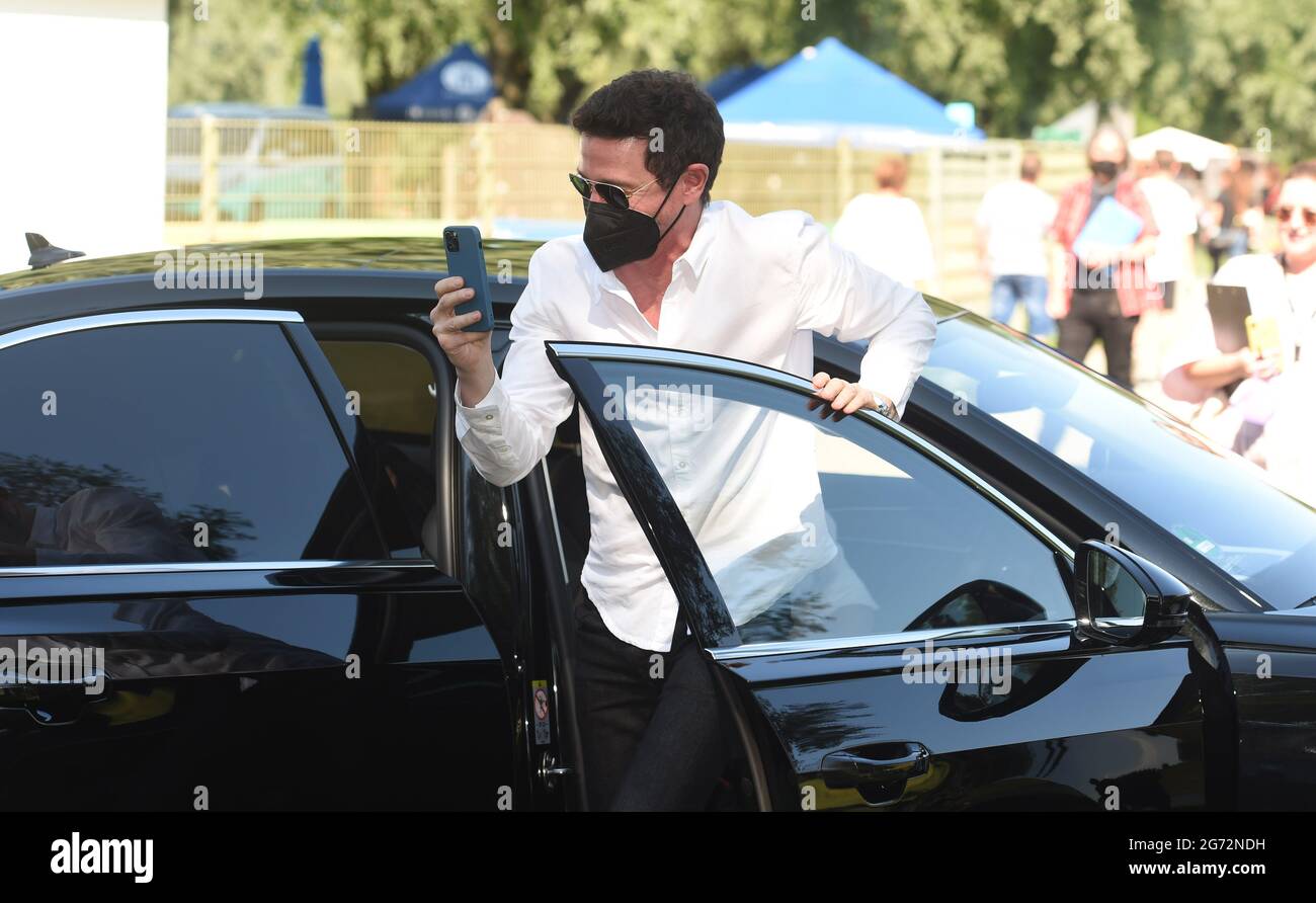 Munich, Germany. 10th July, 2021. Producer Oliver Berben arrives by car ...