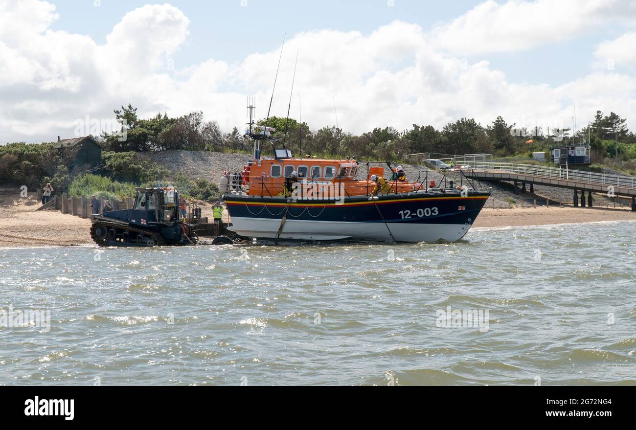 Small life boat being launched Stock Photo - Alamy