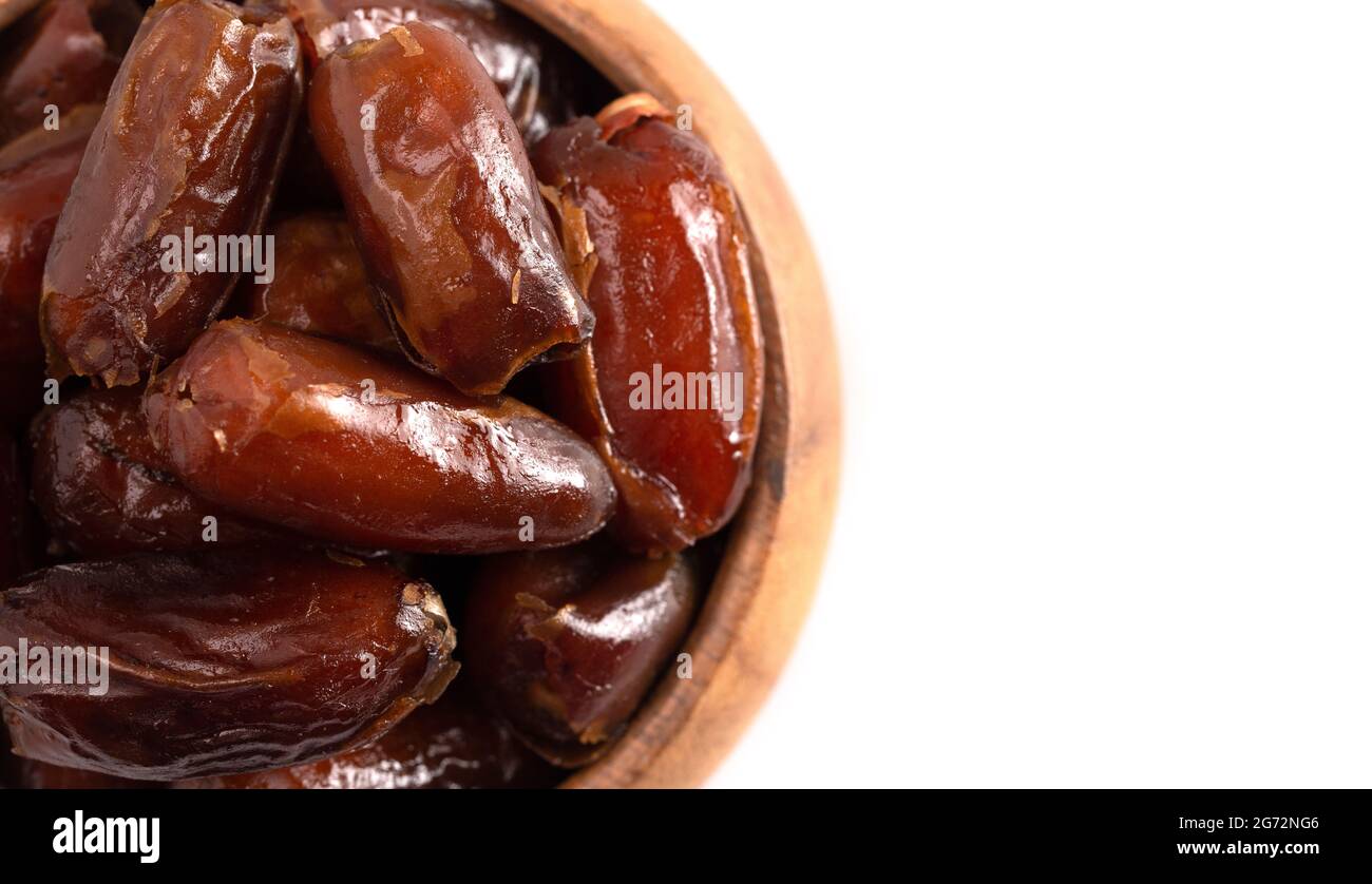 A Bowl of Pitted Dates Isolated on a White Background Stock Photo - Alamy