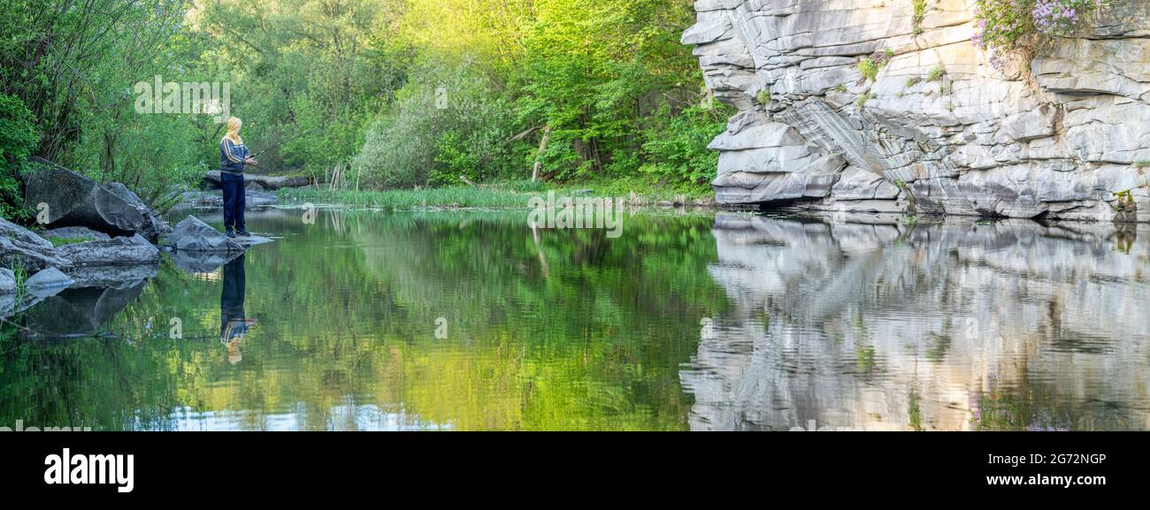 Fisherman in boat catches hi-res stock photography and images - Alamy