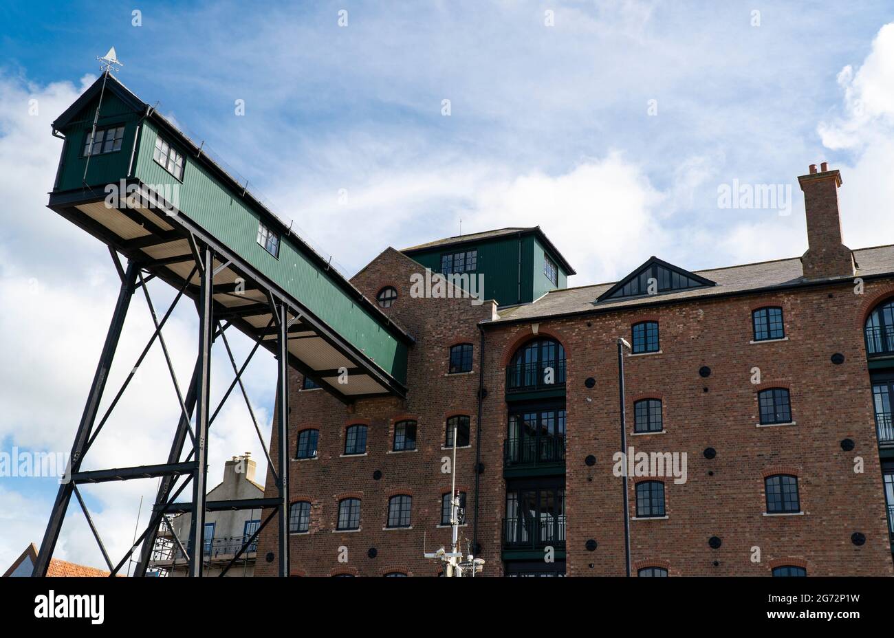 Large dock warehouse building and gantry Stock Photo - Alamy