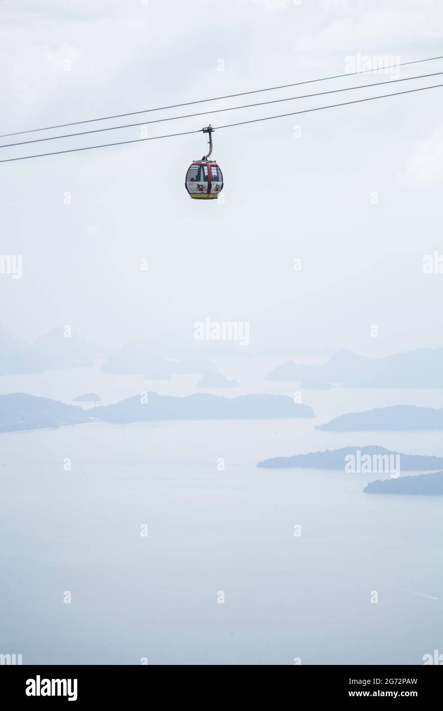 cable car with people. great tourist view point on langkawi cable car ...