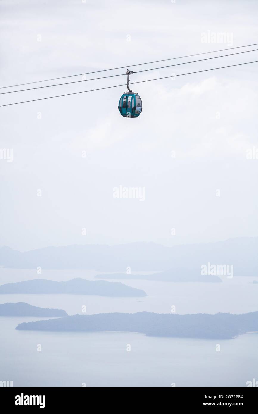 cable car with people. great tourist view point on langkawi cable car ...