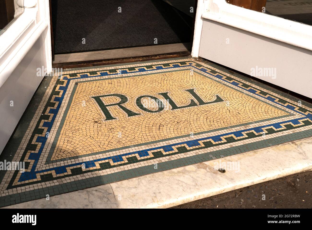 Vintage shop doorway step sign Stock Photo - Alamy