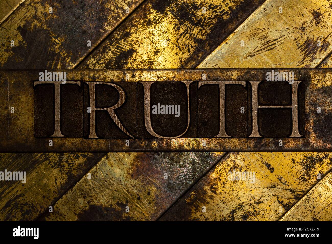Truth text on vintage textured grunge copper and gold background Stock ...