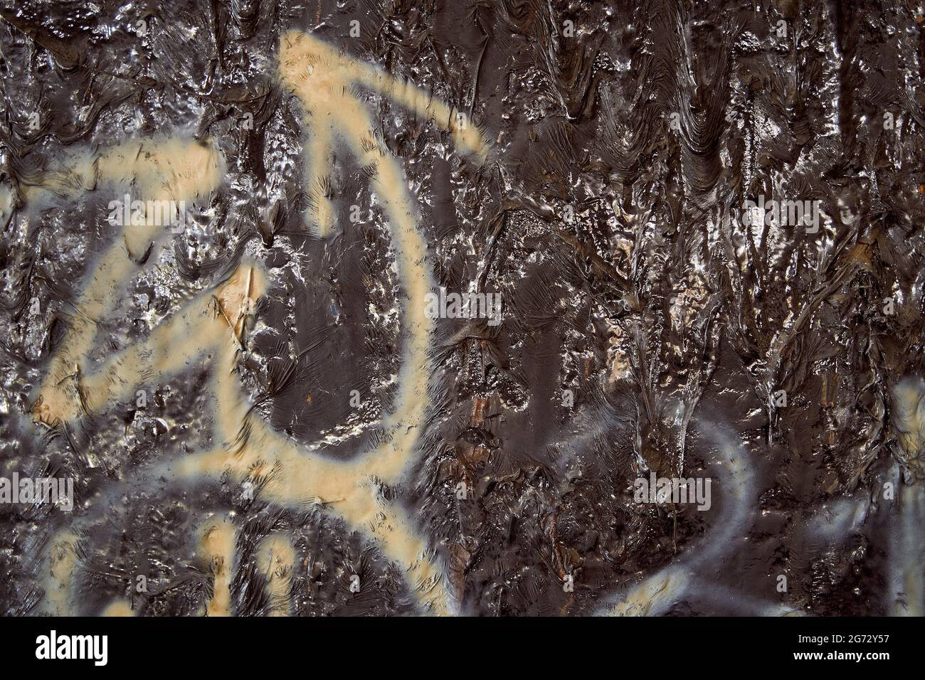 View of the molten wall of black resin Stock Photo - Alamy