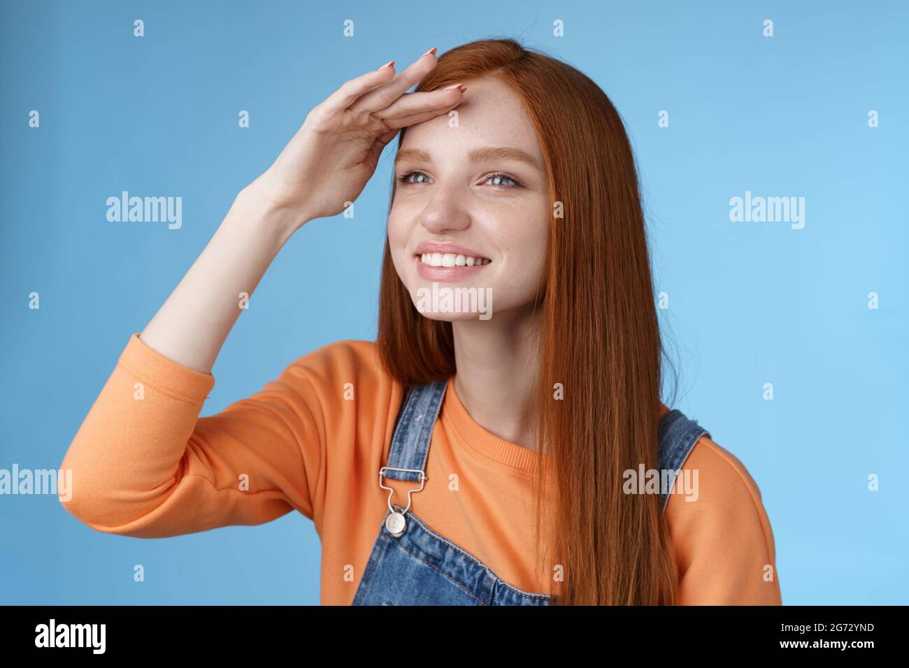 Girl look far distance turn left hold hand forehead cover eyes hot ...