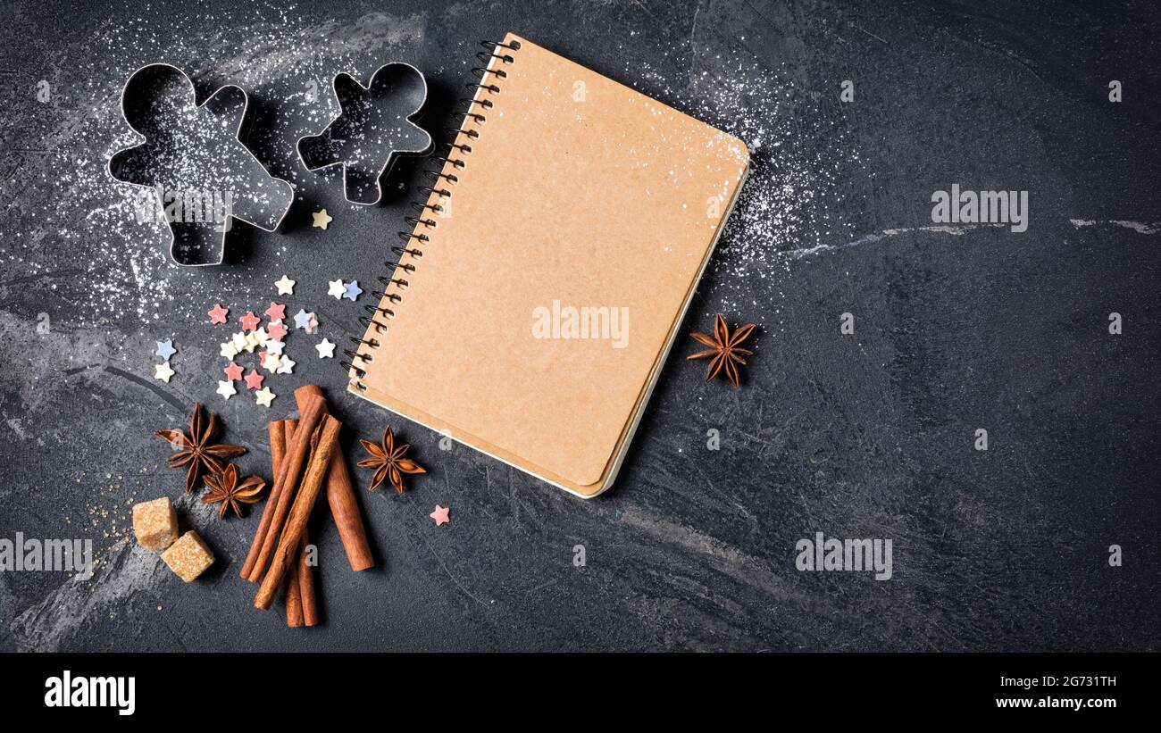 Top view of mockup notepad for recipe and christmas baking ingredients ...