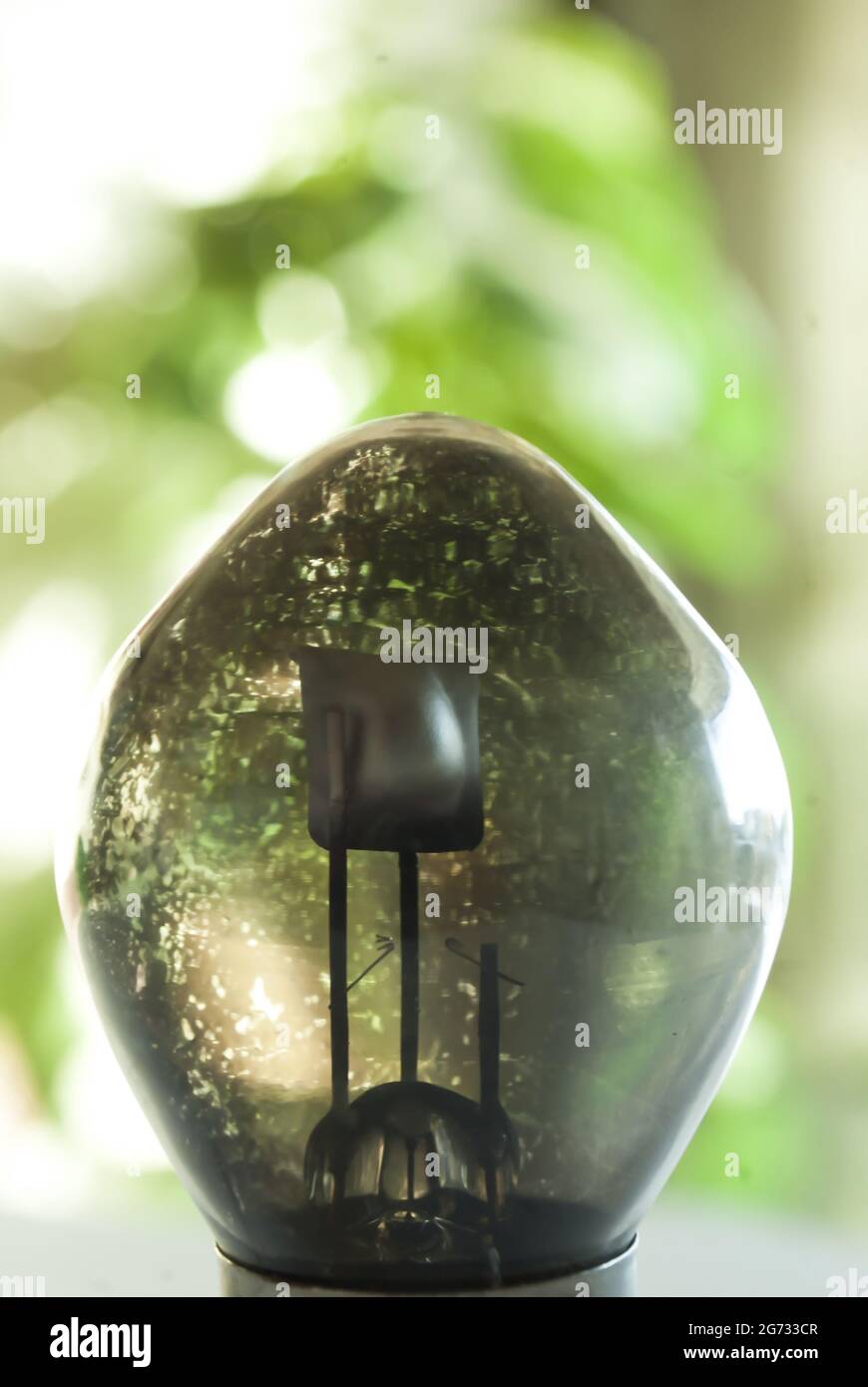 upright dirty dusty macro bulb closeup,messy transparent glass,daylight ...