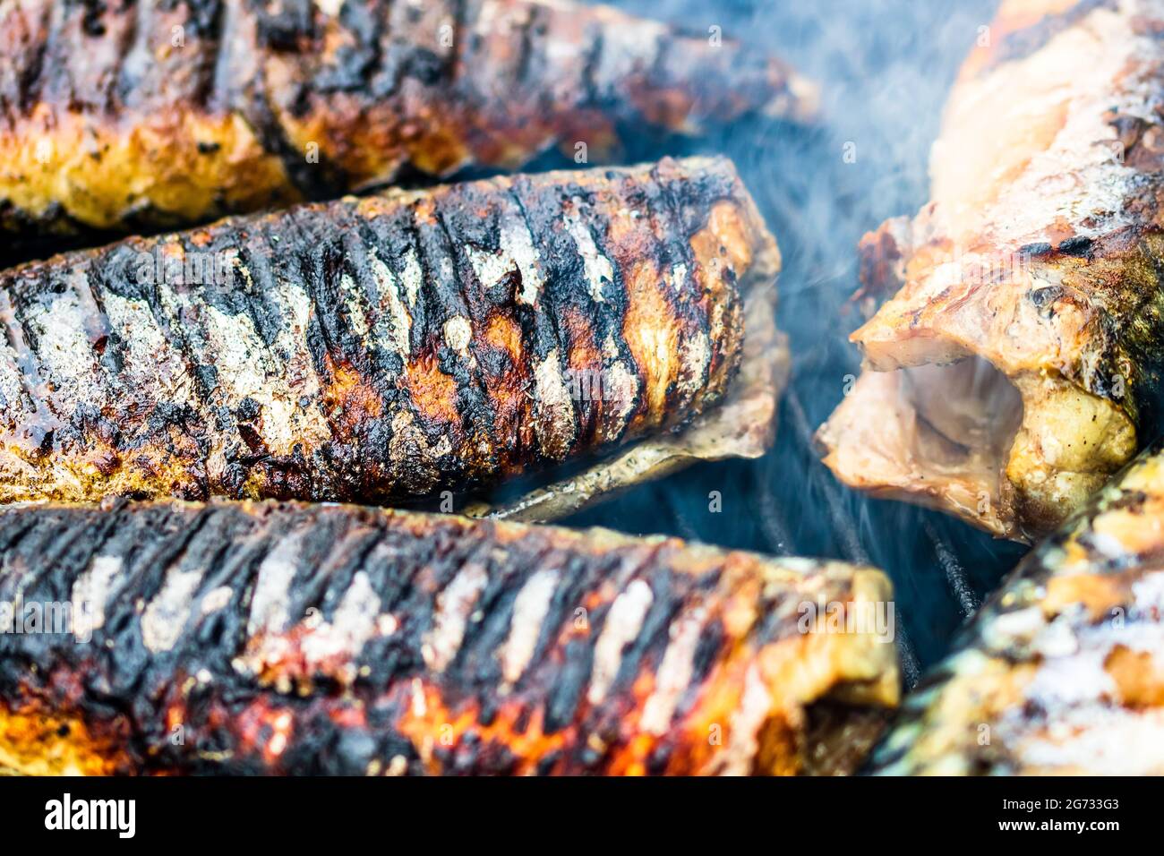 Grilled fish on charcoal grill. Fresh fish barbecue Stock Photo - Alamy