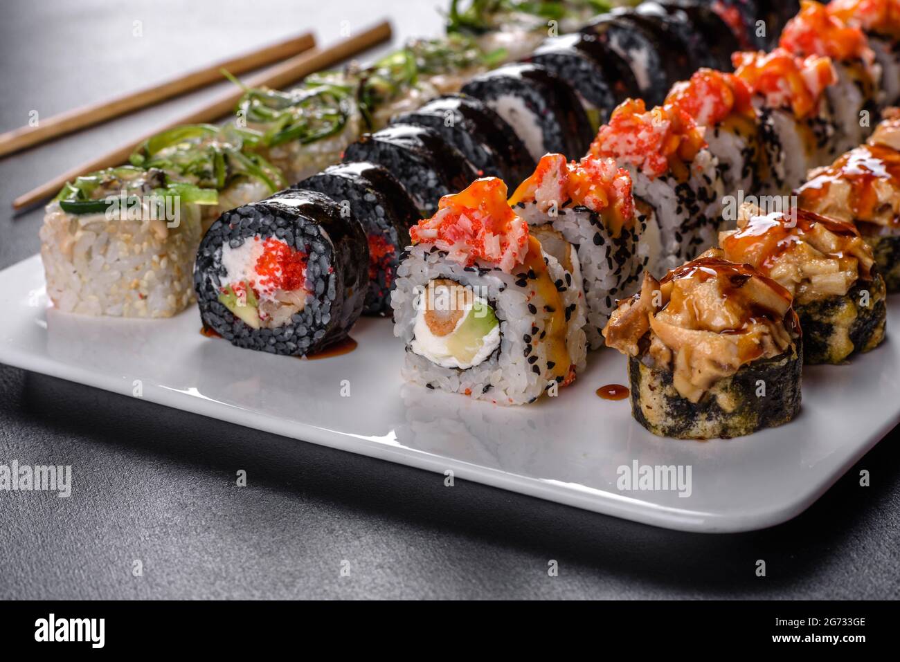 Japanese sushi food. Maki ands rolls with tuna, salmon, shrimp, crab ...