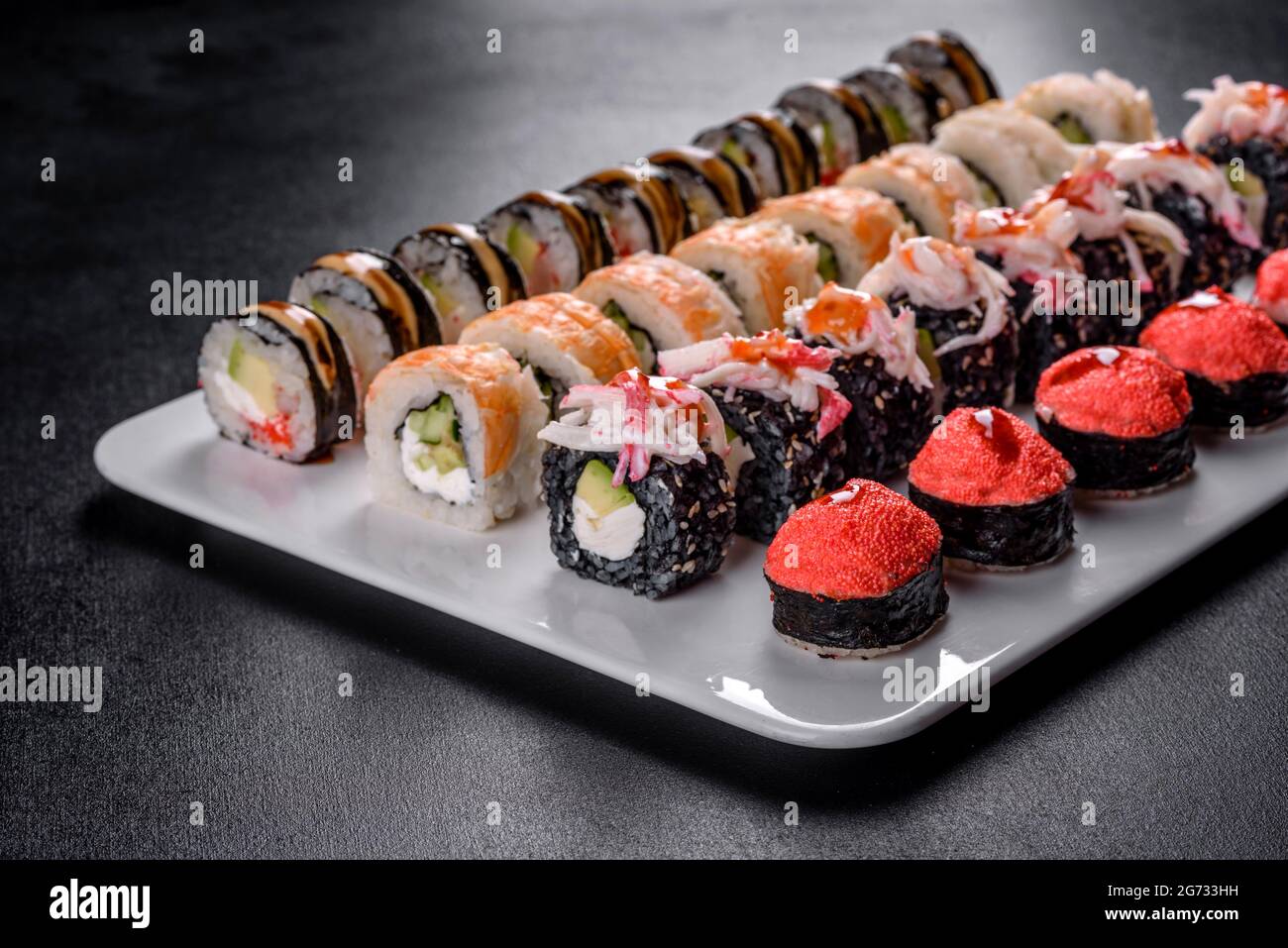Japanese sushi food. Maki ands rolls with tuna, salmon, shrimp, crab ...