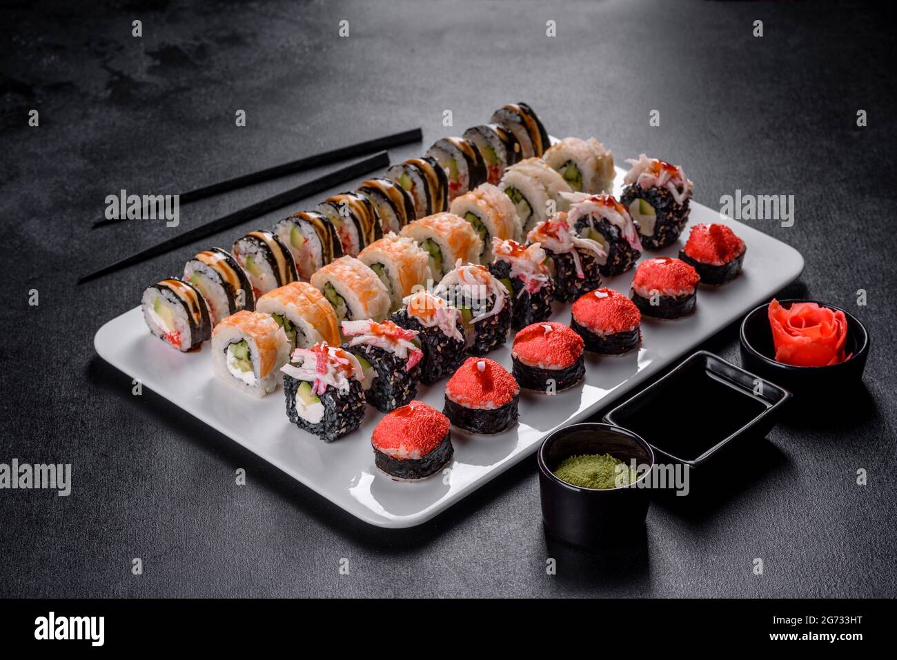 Japanese sushi food. Maki ands rolls with tuna, salmon, shrimp, crab ...