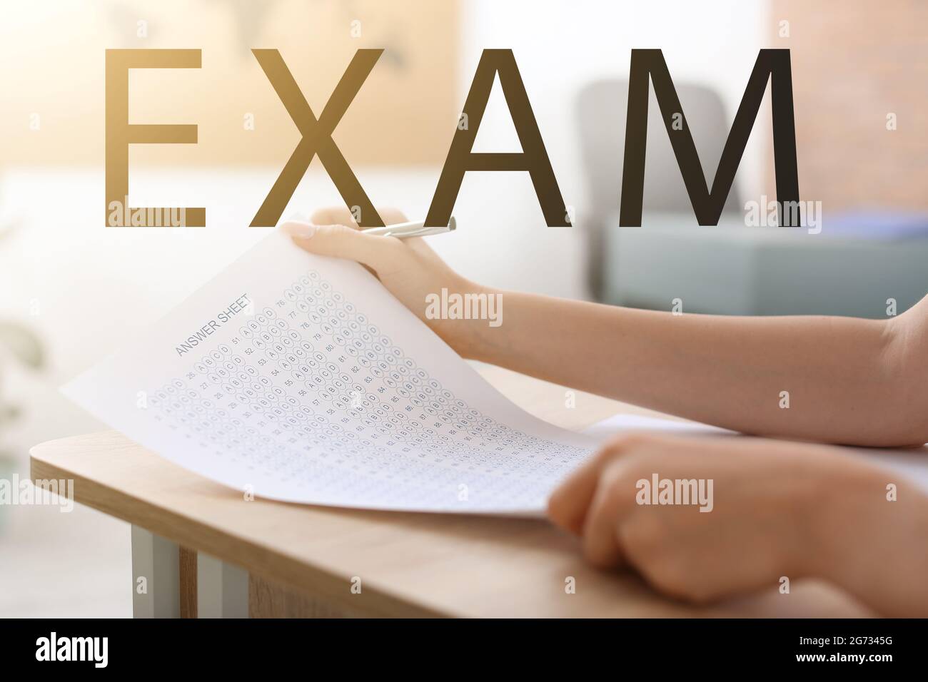 Student passing exam at university Stock Photo - Alamy
