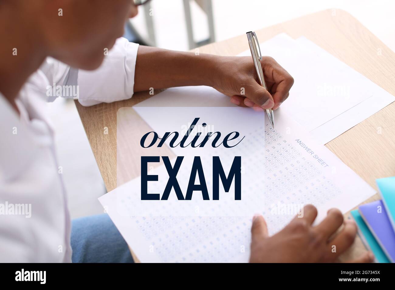 African-American student passing exam at home Stock Photo - Alamy