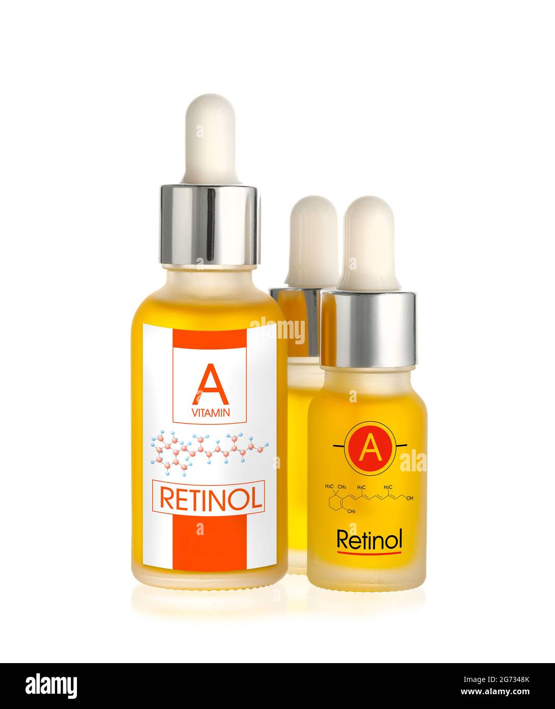 Bottles of vitamin A oil on white background Stock Photo - Alamy