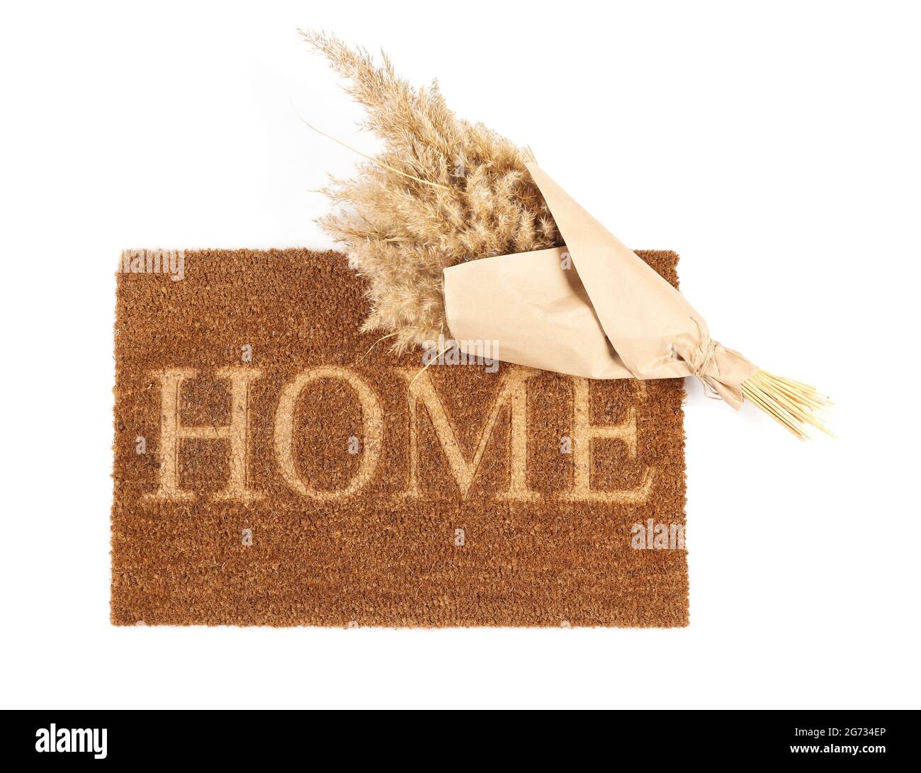 Doormat with bouquet on white background Stock Photo - Alamy