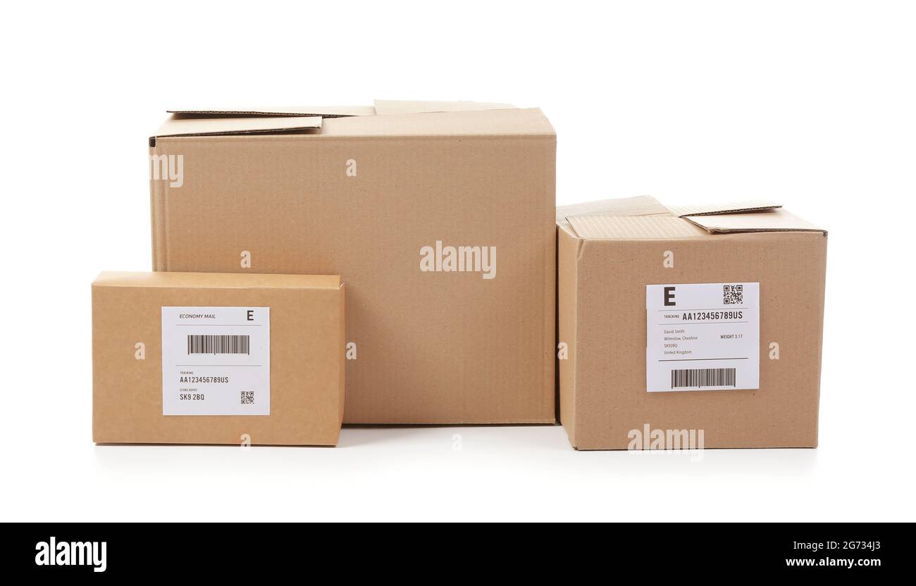 Different parcels on white background Stock Photo - Alamy