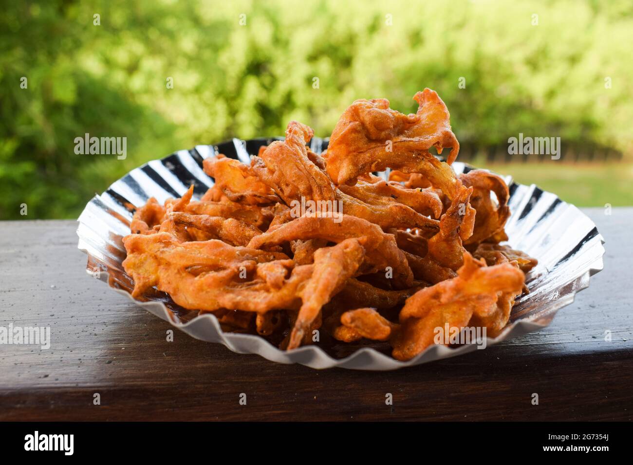 Delicious Onion pakoda or pyaz ke pakode, bhajiya. Indian Pakistani tea ...