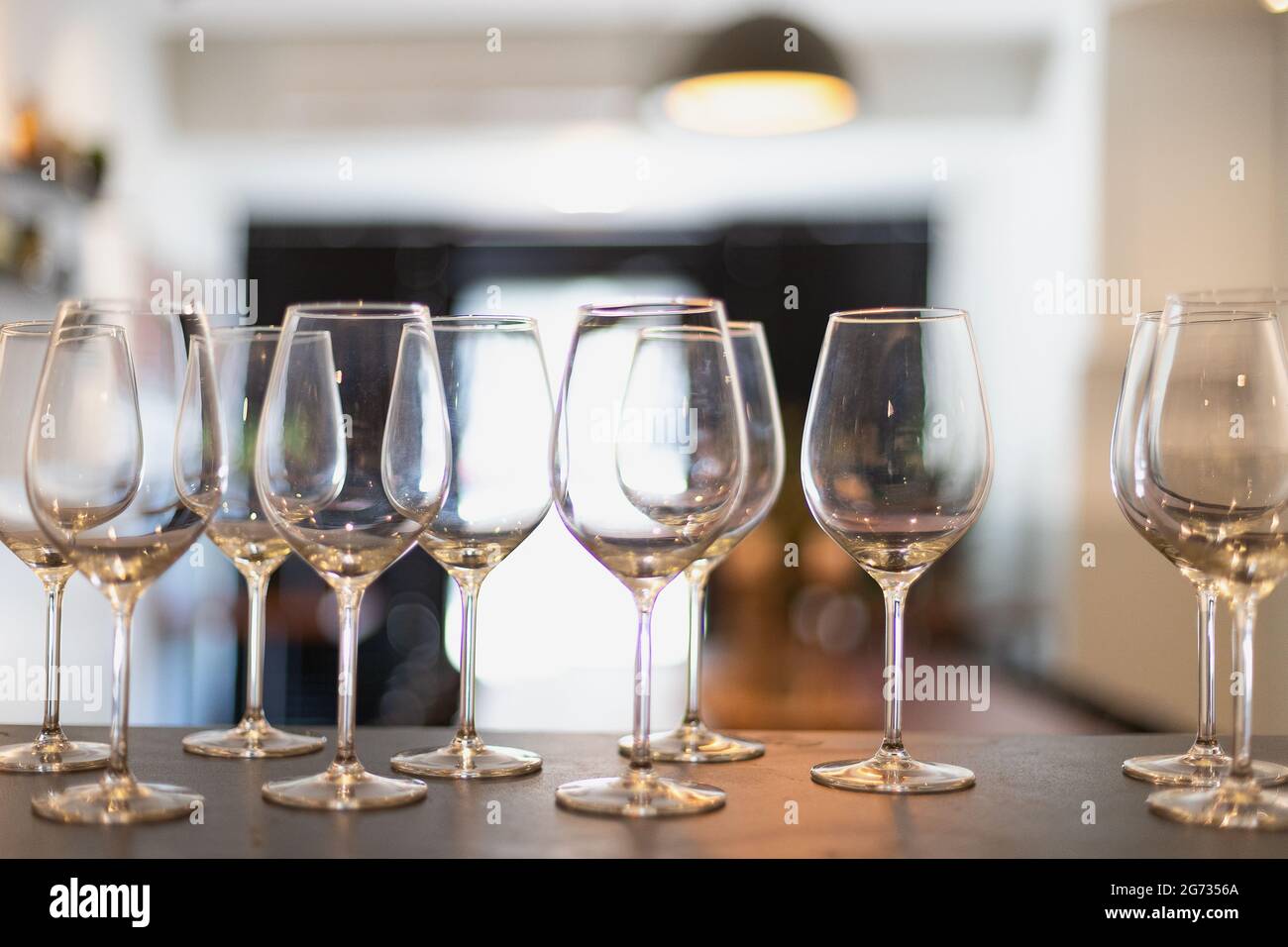 empty glasses on a light background Stock Photo - Alamy