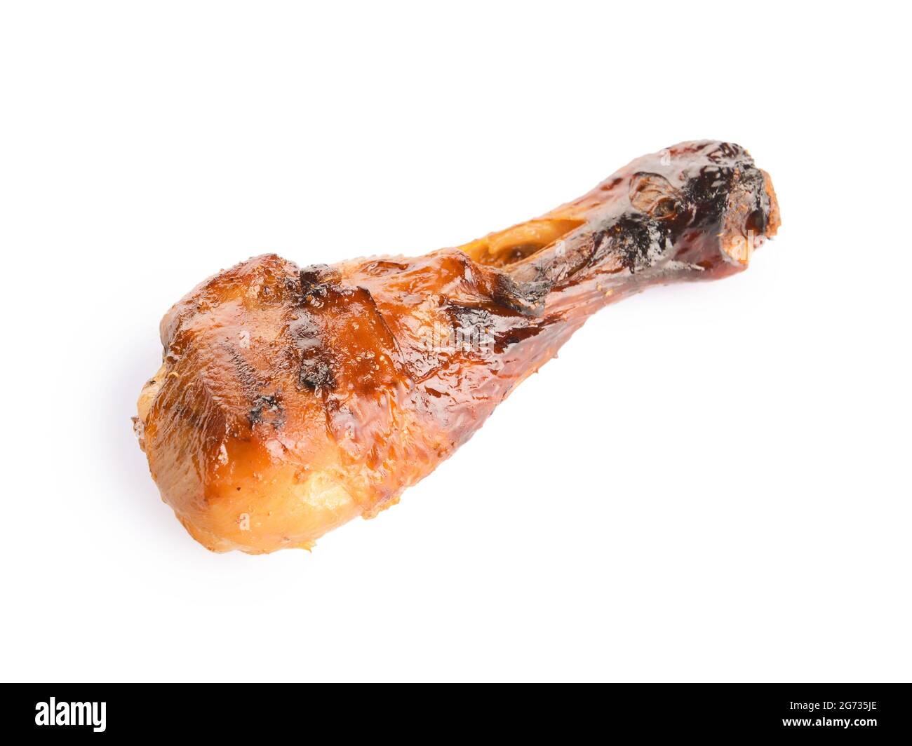 Roasted chicken leg on white background Stock Photo - Alamy