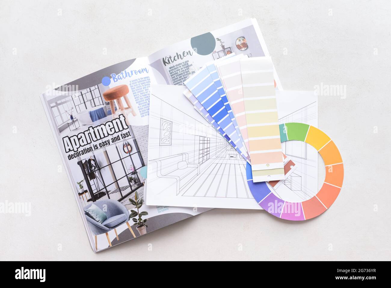 Paint color samples with house plan and magazine on white background ...