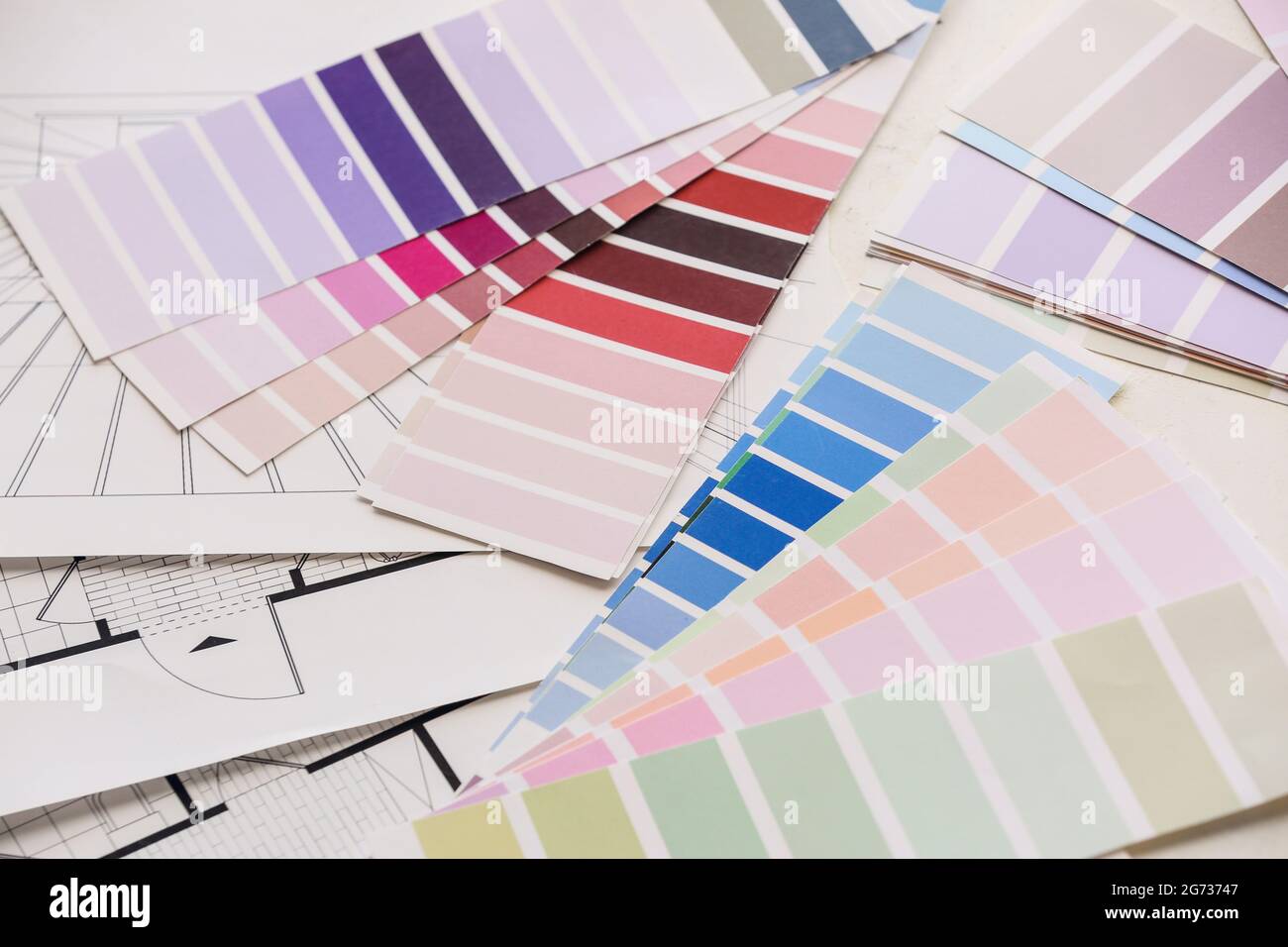 Paint color palettes and house plans on white background, closeup Stock ...