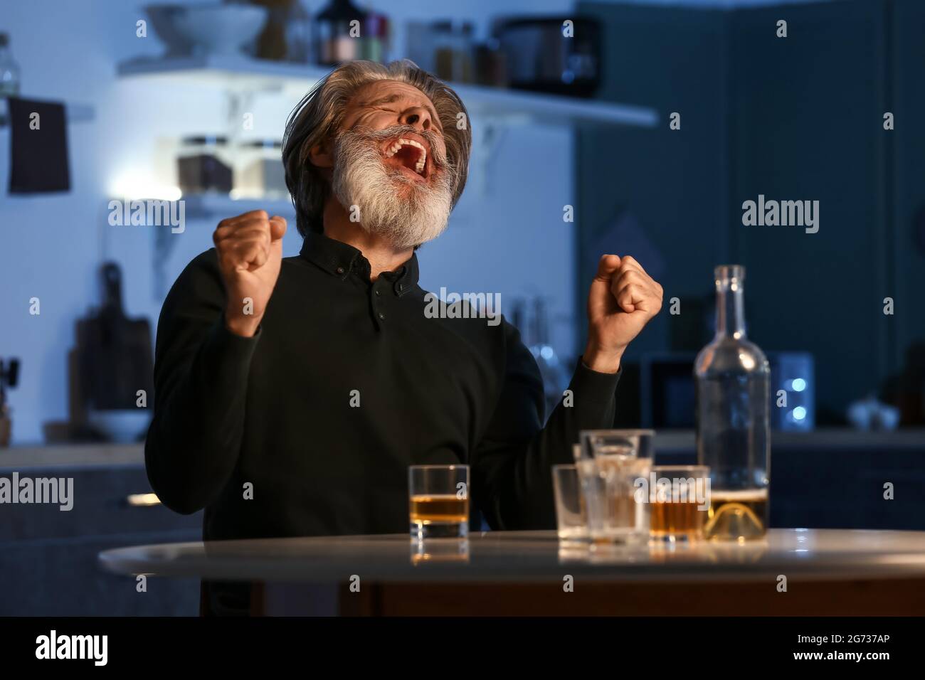 Angry desperate man sitting hi-res stock photography and images - Alamy