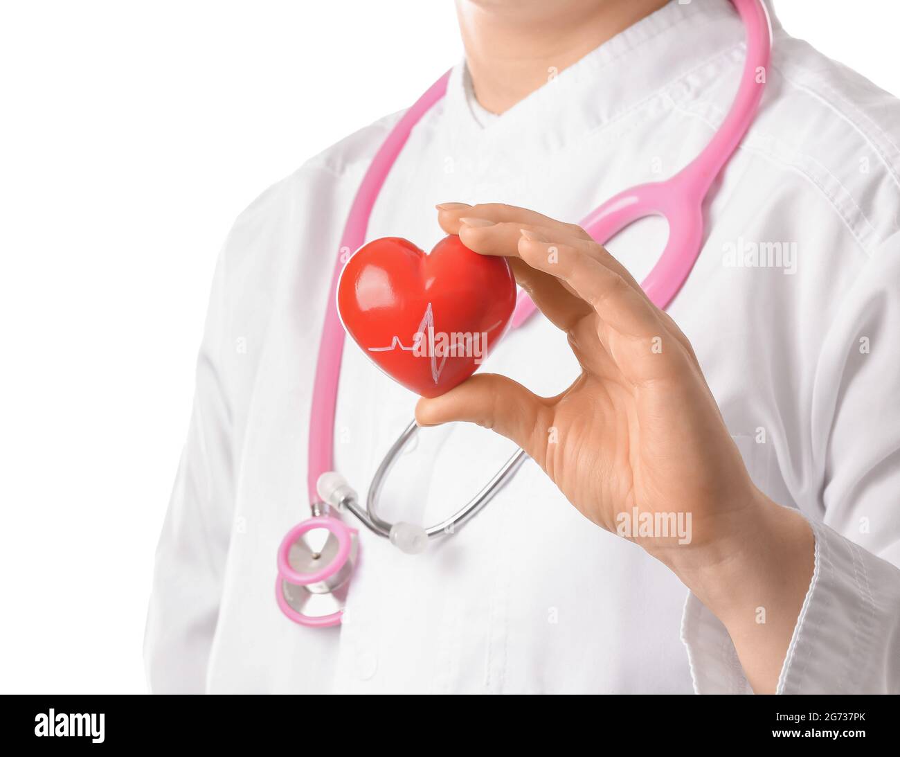 Female cardiologist with red heart on white background, closeup Stock ...