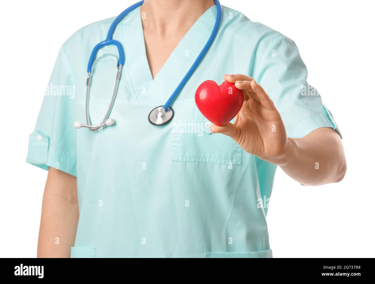 Female cardiologist with red heart on white background Stock Photo - Alamy