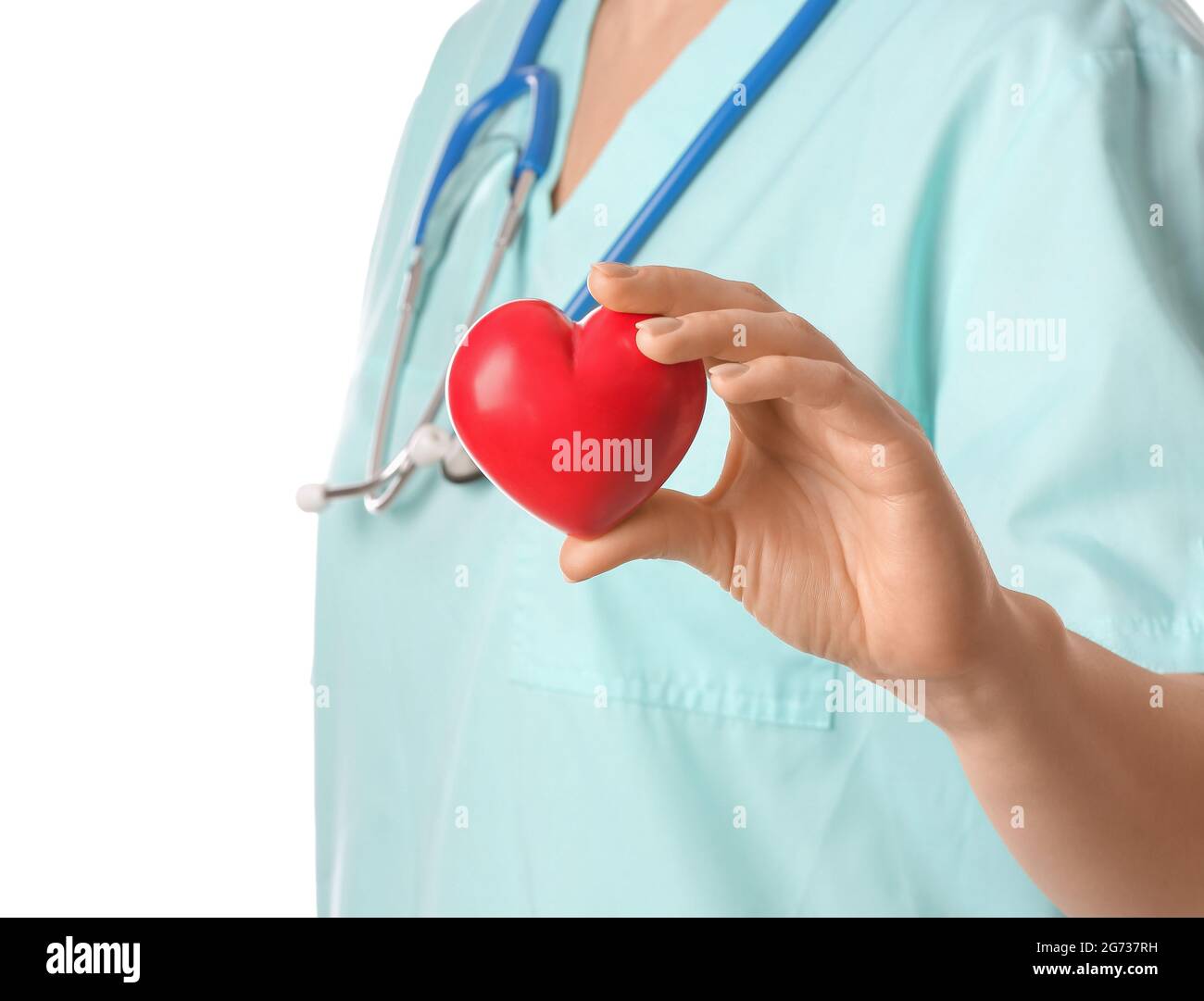Female cardiologist with red heart on white background, closeup Stock ...