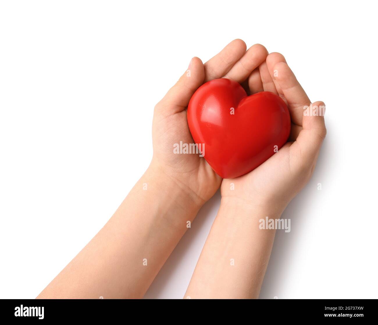 Child's hands with red heart on white background Stock Photo - Alamy