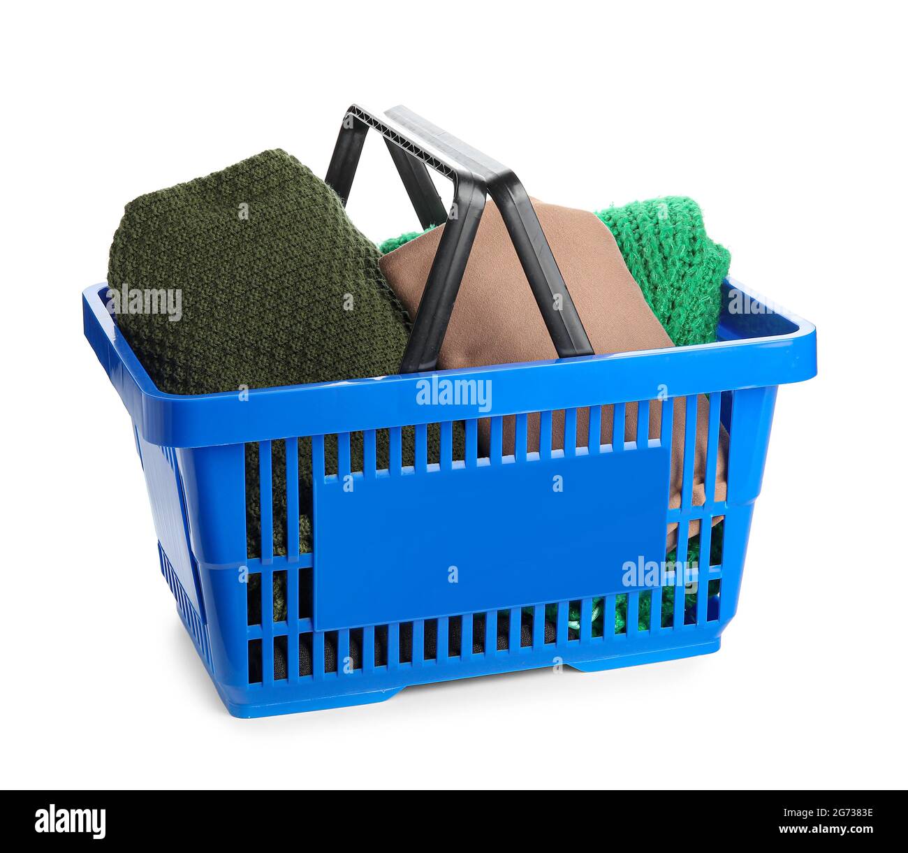 Shopping basket with clothes on white background Stock Photo - Alamy