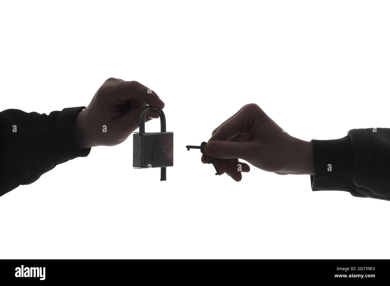 Silhouette of hands with lock and key on white background Stock Photo ...