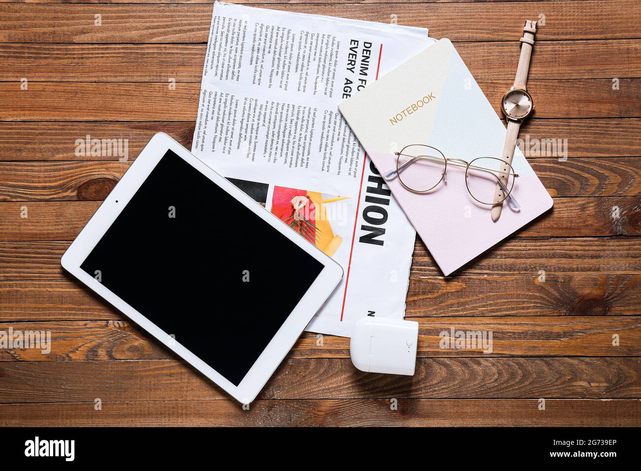 Composition with eyeglasses and tablet computer on wooden background Stock Photo - Alamy