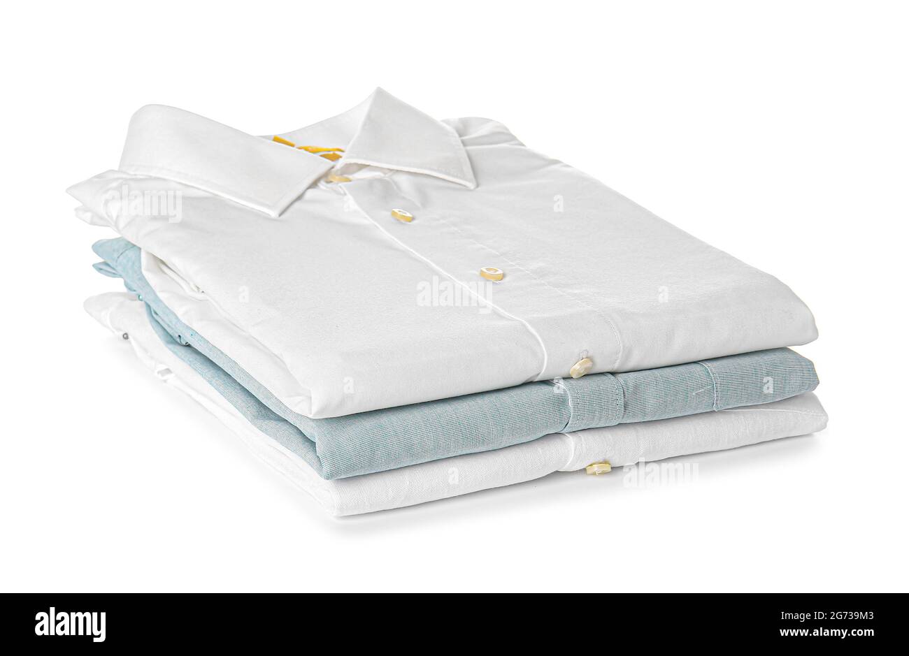 Stack of male shirts on white background Stock Photo - Alamy