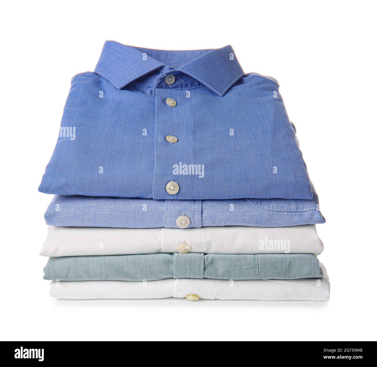 Stack of male shirts on white background Stock Photo - Alamy