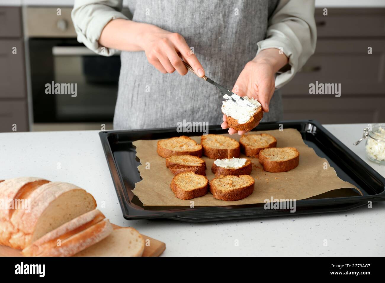 Female chef preparing toasts hi-res stock photography and images - Alamy