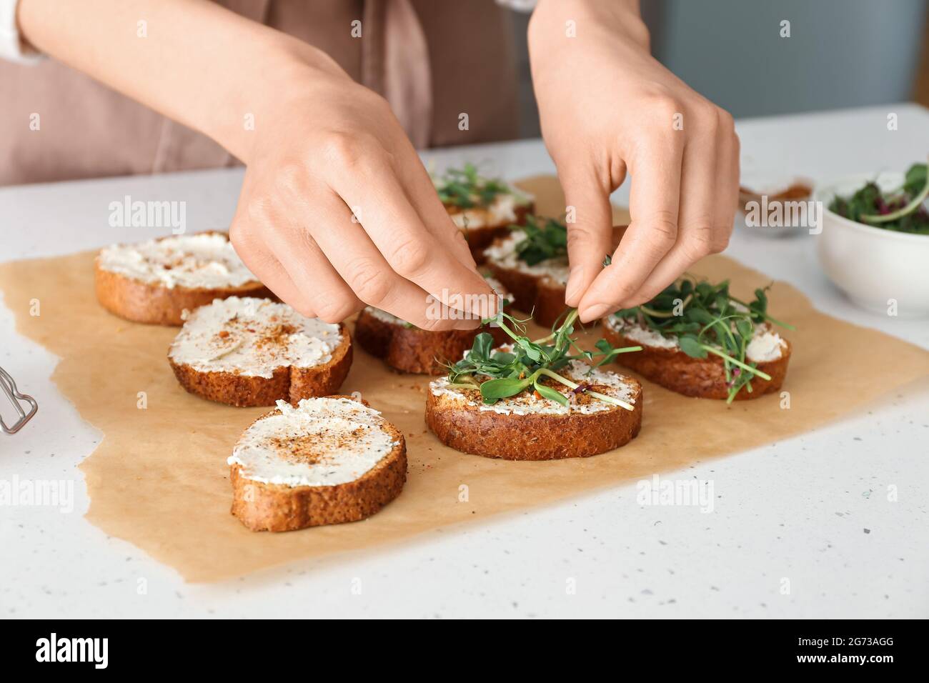 Female chef preparing toasts hi-res stock photography and images - Alamy