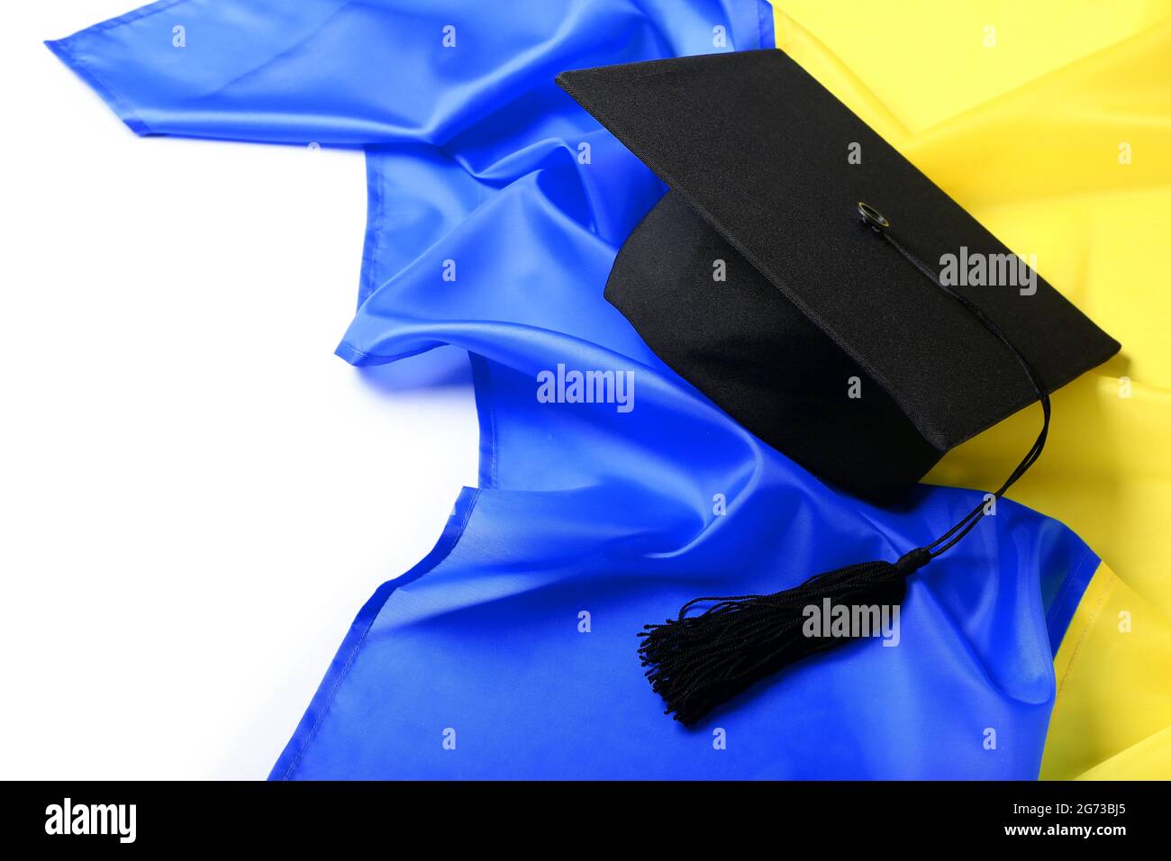 Graduation hat with flag of Ukraine on white background Stock Photo - Alamy