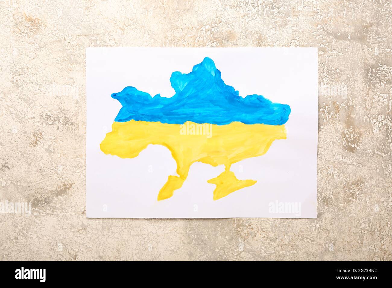 Paper sheet with painting of Ukrainian flag on grunge background Stock ...