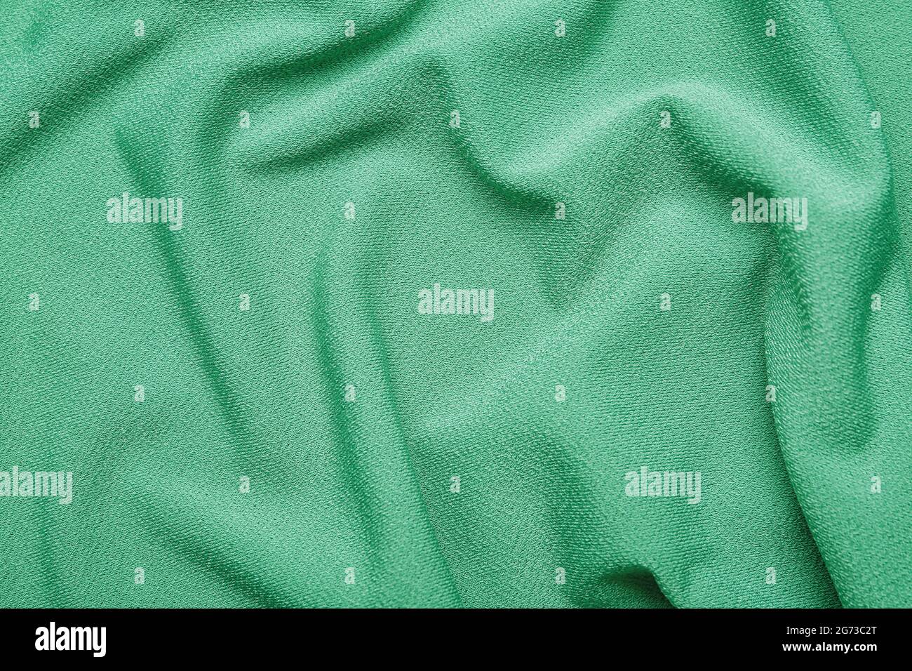 Texture of color fabric with folds Stock Photo - Alamy