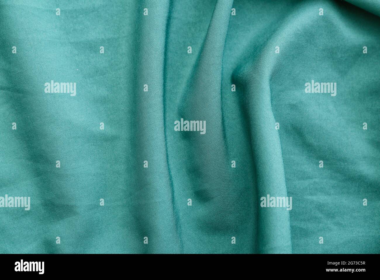 Texture of color fabric with folds Stock Photo - Alamy