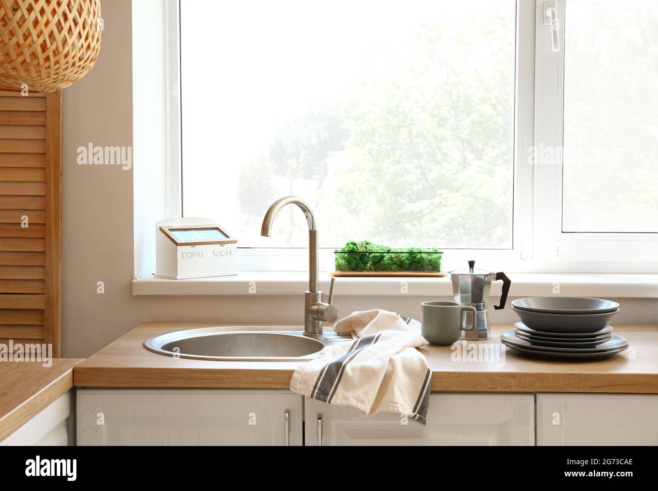 Interior of modern kitchen with big window Stock Photo - Alamy