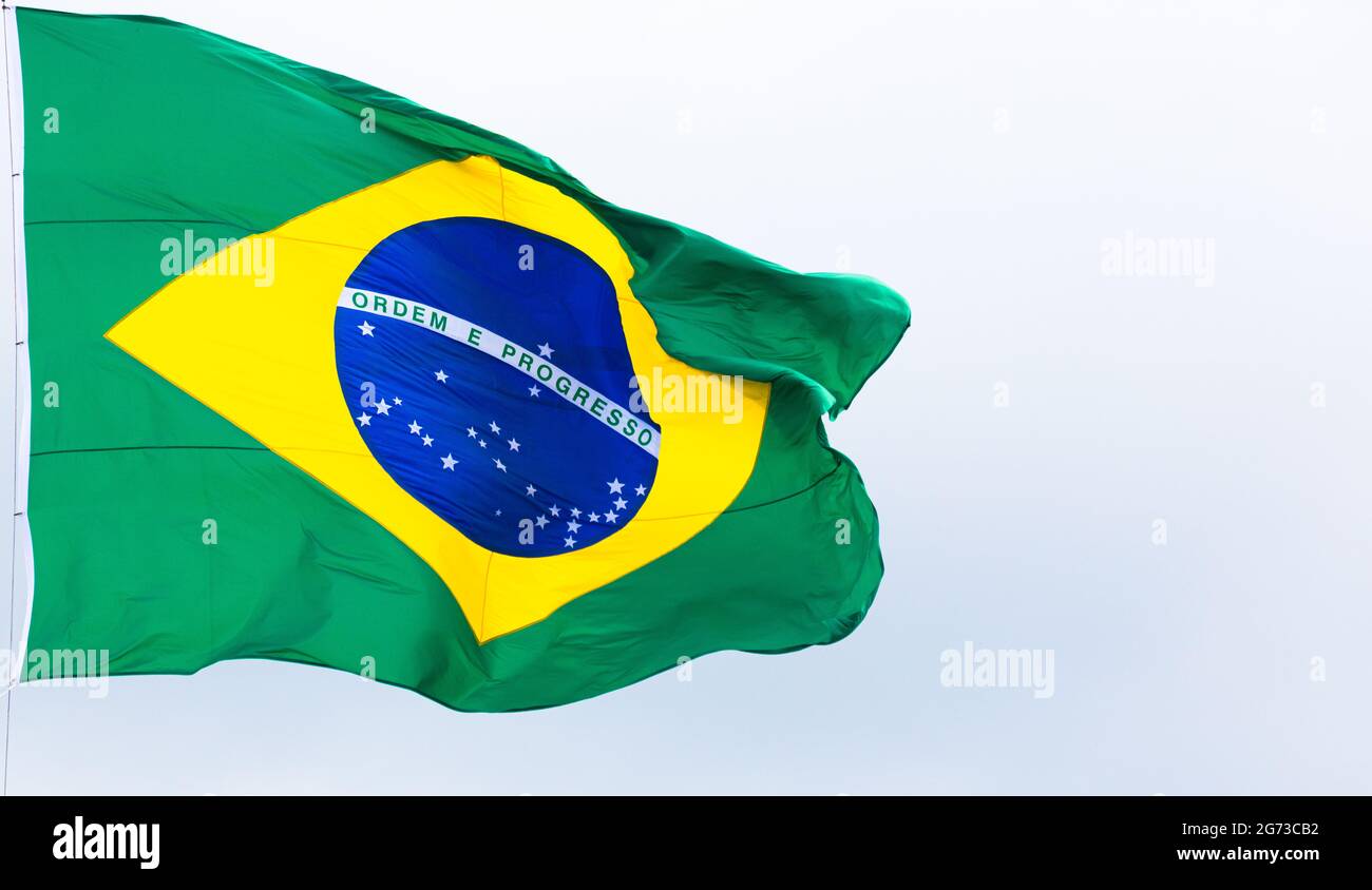 Brazilian flag waving in the wind Stock Photo - Alamy