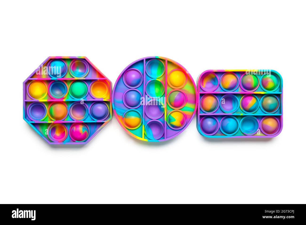 Bright fidget toys on white background Stock Photo - Alamy