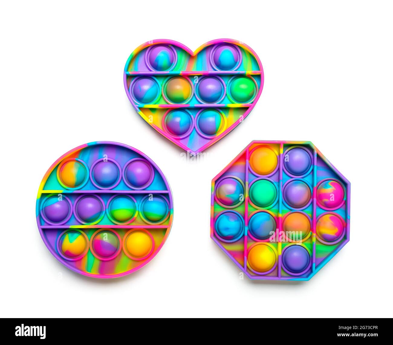 Bright fidget toys on white background Stock Photo - Alamy